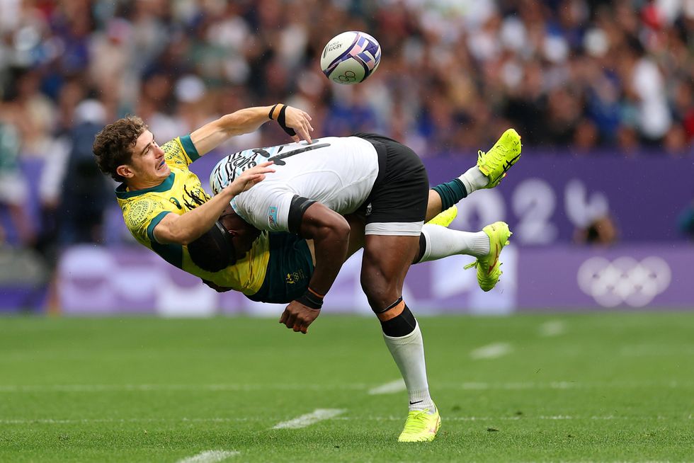 10 pics of hot Olympic rugby players manhandling each other