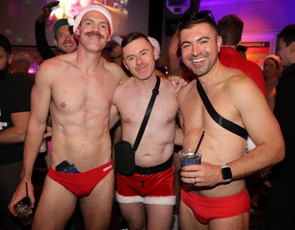 These sexy Santas showed up in Speedos for a good cause
