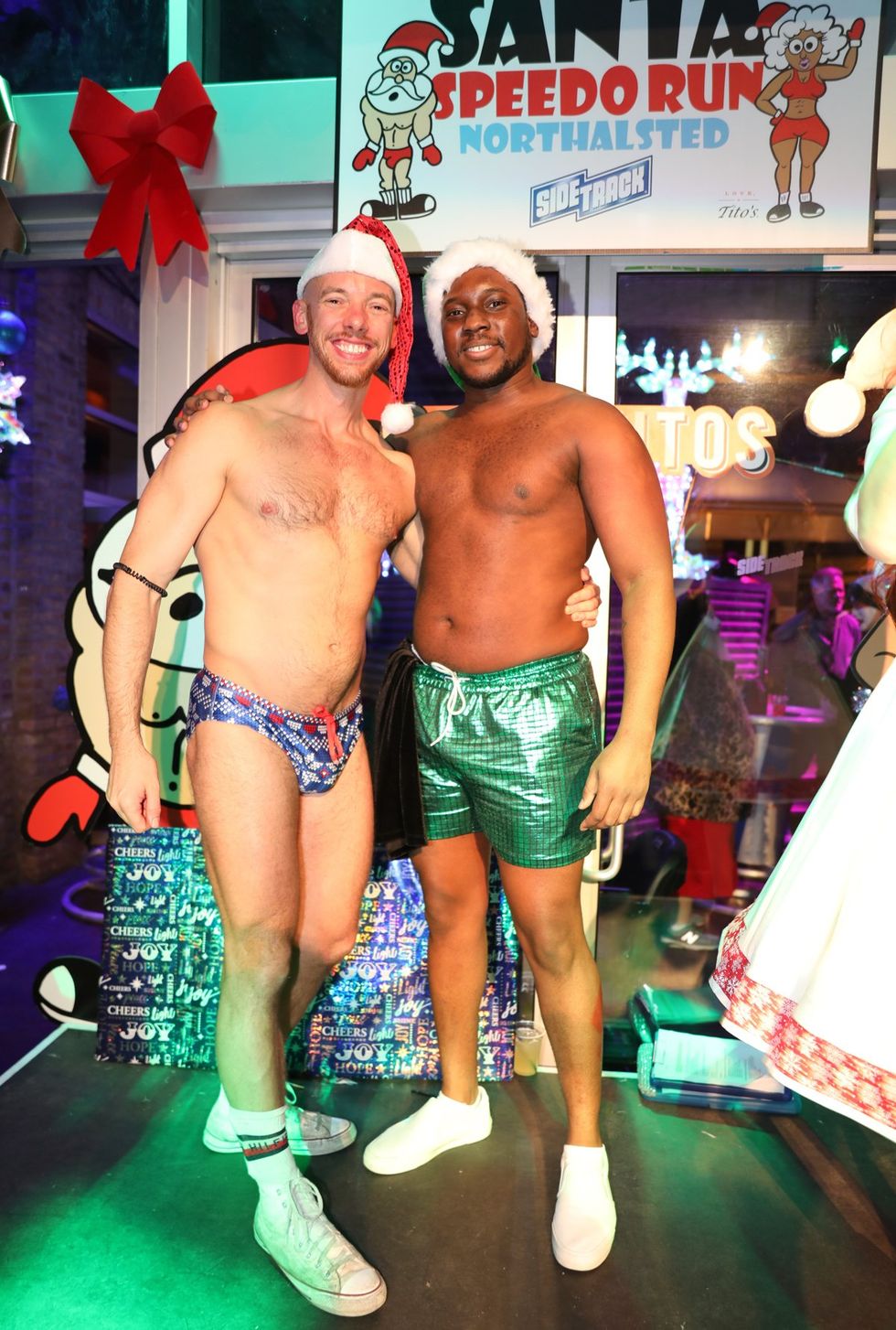 These sexy Santas showed up in Speedos for a good cause