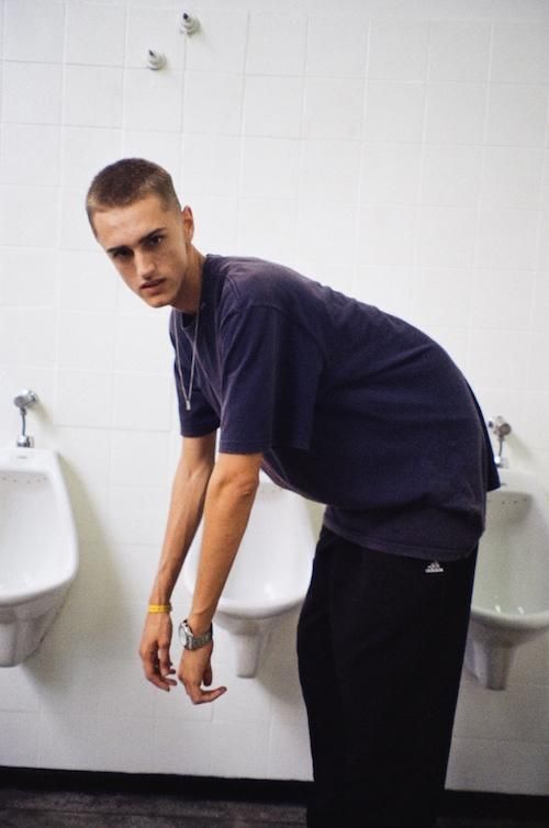 Male Models Pose By Toilets at Sao Paolo Fashion Week