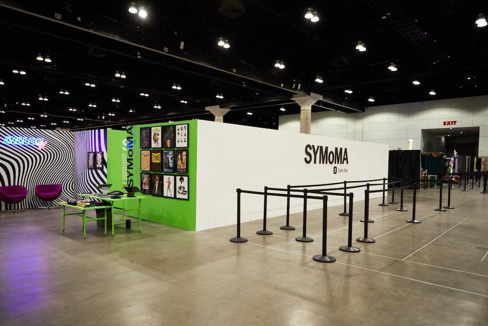 SYMoMA: 16 Photos of Symone's Iconic DragCon Booth Turned Art Gallery