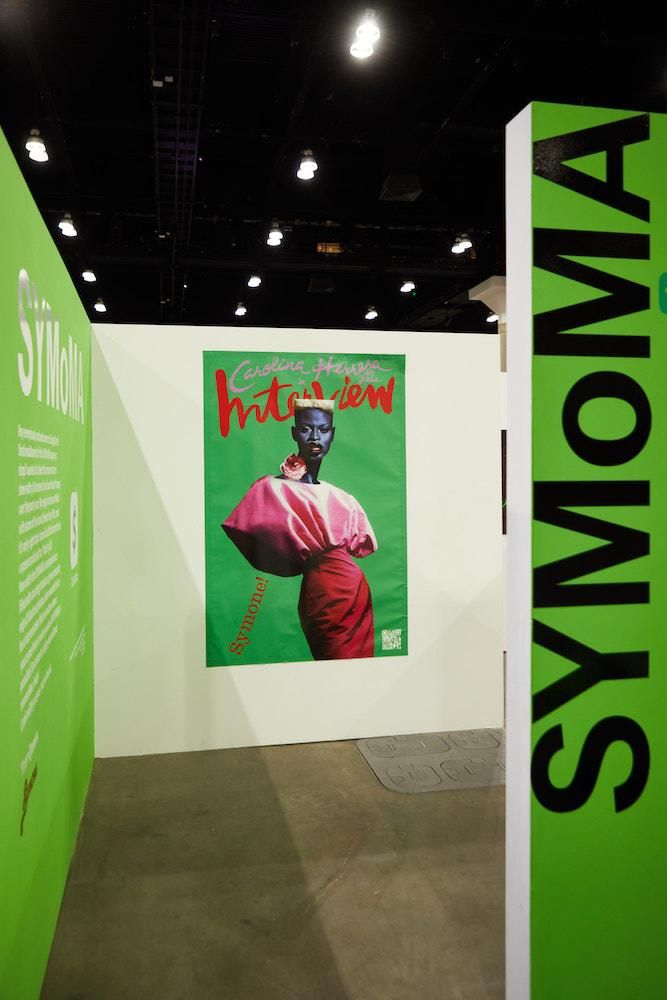 SYMoMA: 16 Photos of Symone's Iconic DragCon Booth Turned Art Gallery
