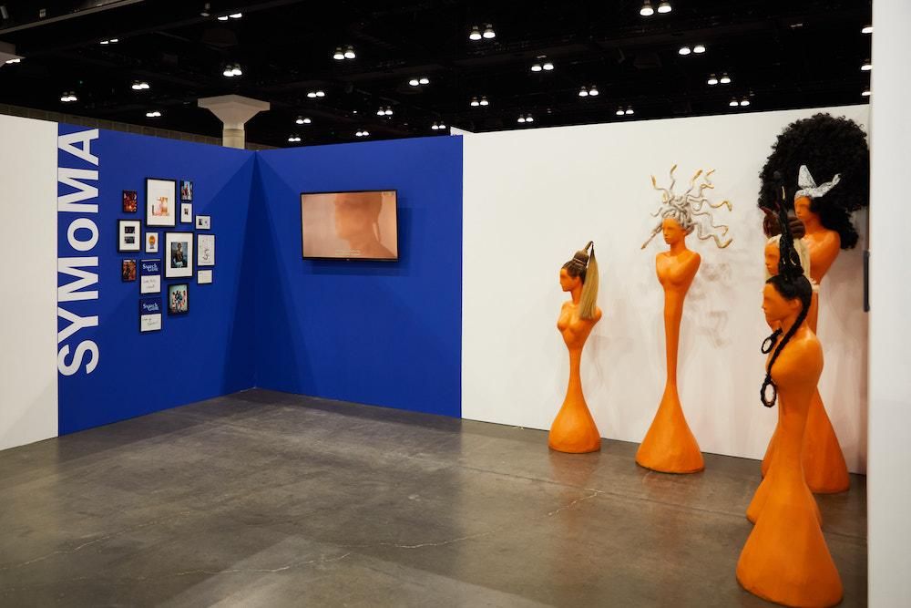 SYMoMA: 16 Photos of Symone's Iconic DragCon Booth Turned Art Gallery