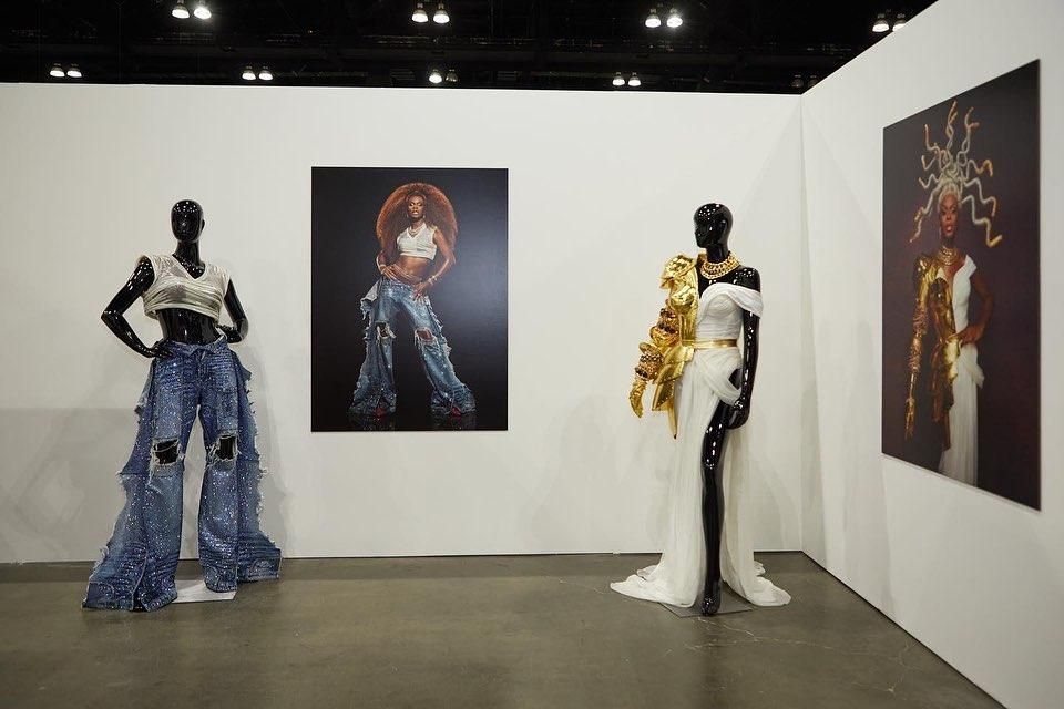 SYMoMA: 16 Photos of Symone's Iconic DragCon Booth Turned Art Gallery